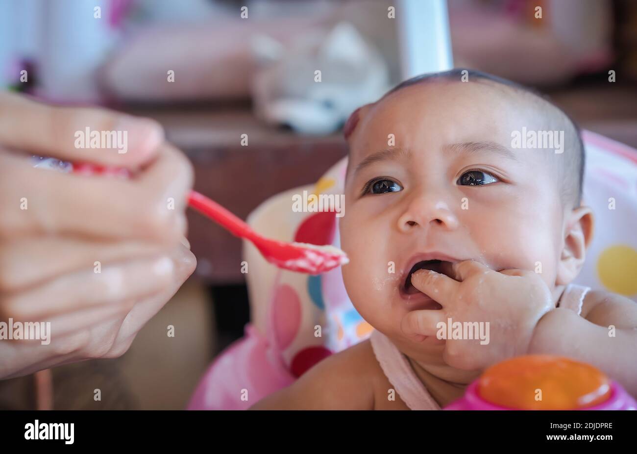 Baby crying food feeding hi-res stock photography and images - Alamy