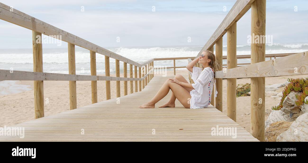 Woman young bikini bridge sea hi-res stock photography and images - Alamy