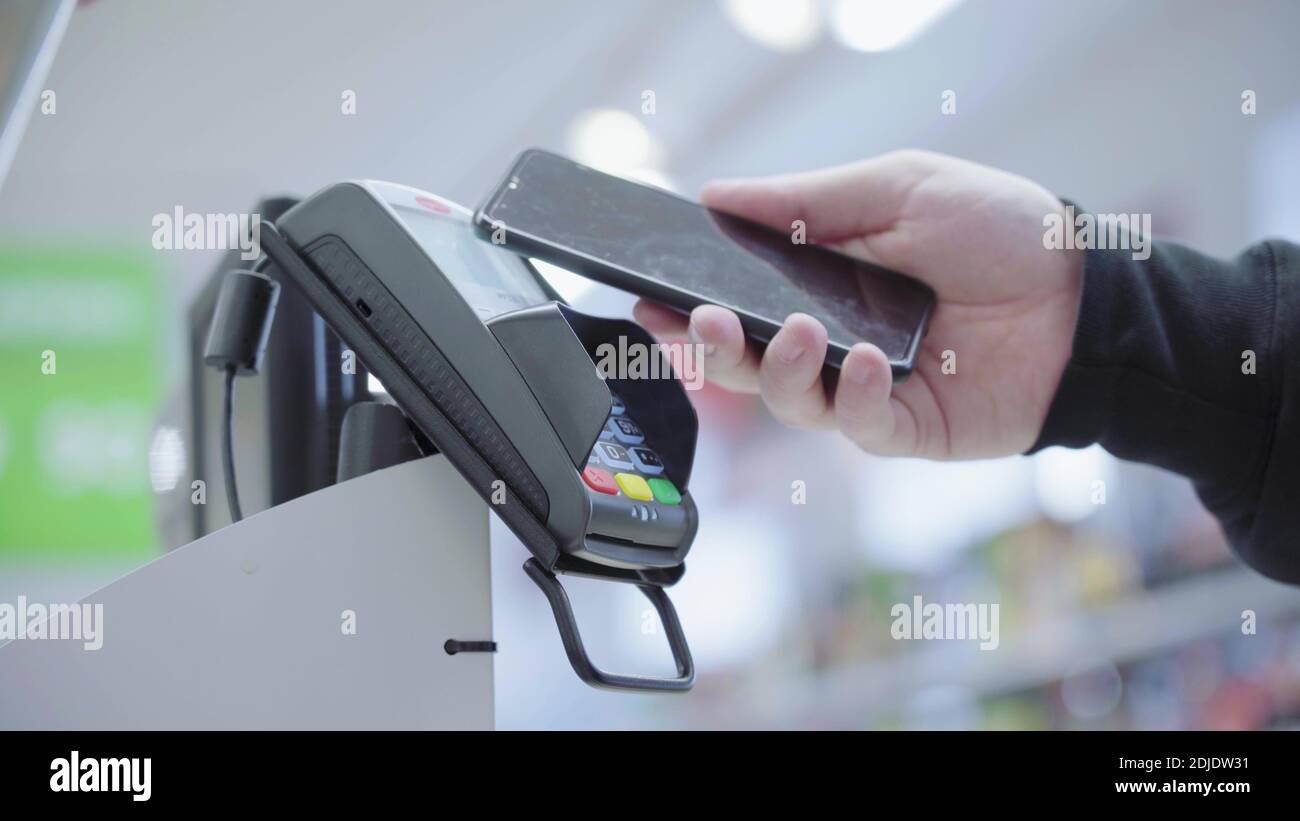 Pay for goods through the terminal in a contactless way in a ...