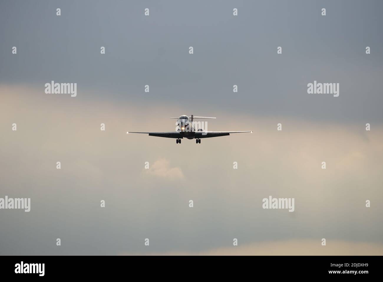 Airplane Flying In Sky At Night Stock Photo - Alamy