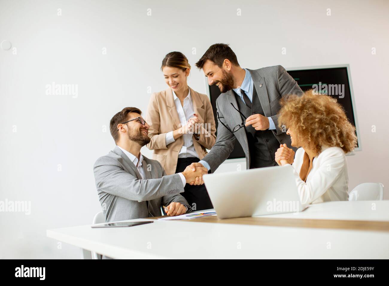 Group of multiethnic young business people working together in the ...