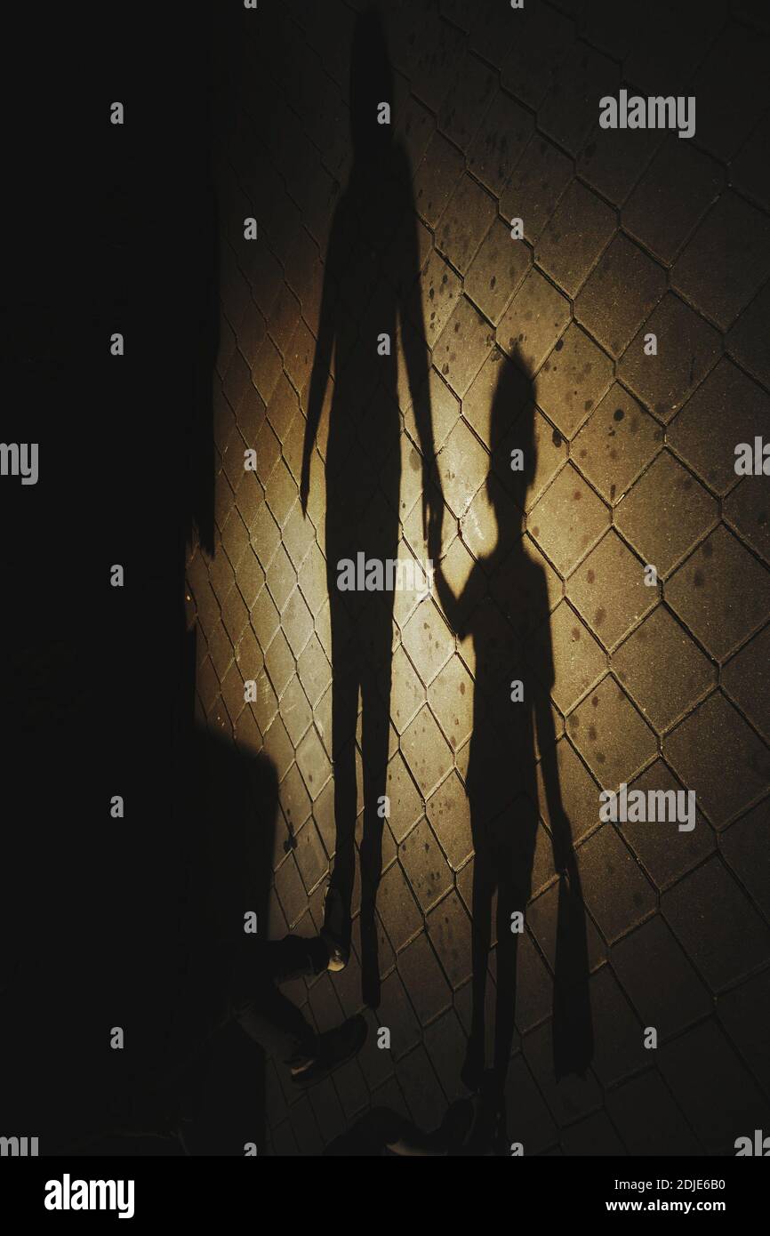 Father son walking night hi-res stock photography and images - Alamy