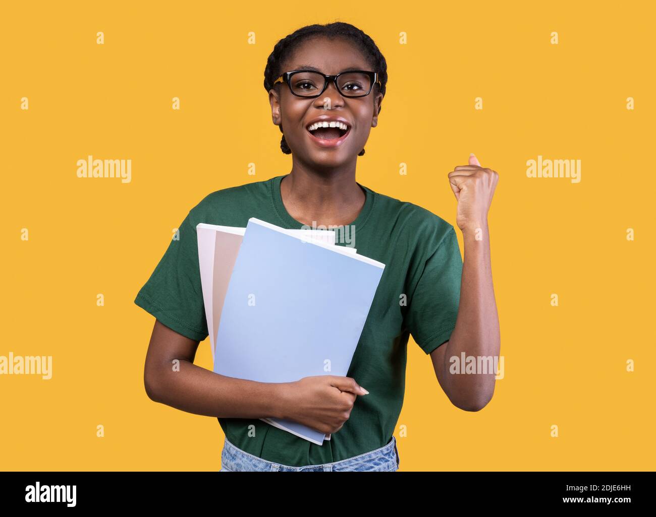 African Student Gesturing Yes After Exam Posing Over Yellow Background ...