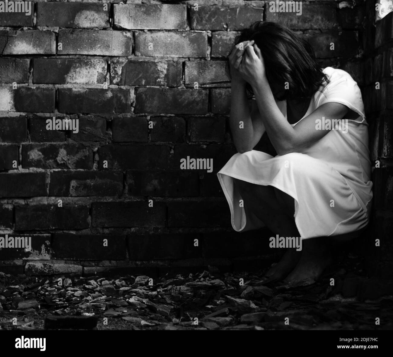 Crouching dress Black and White Stock Photos & Images - Alamy
