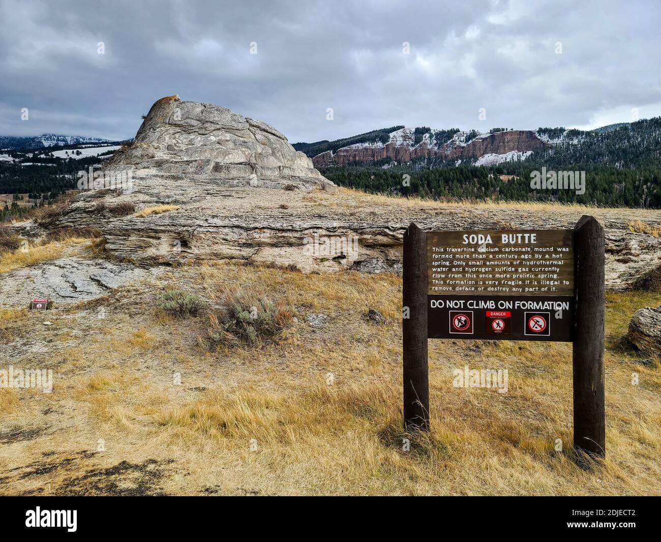Soda Butte sign in front of the hot spring cone in the Lamar Valley ...