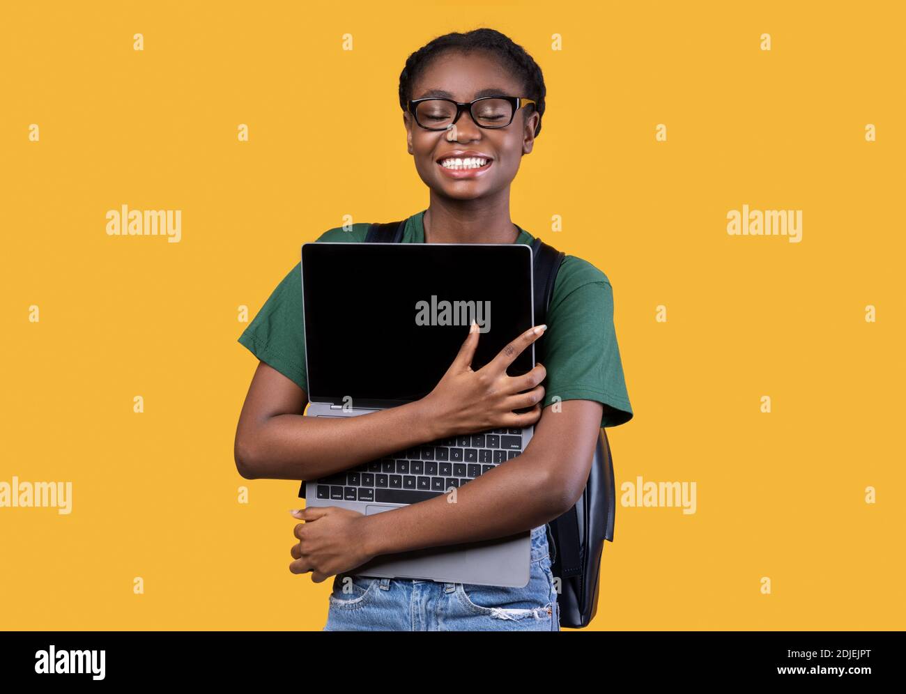 Happy Black Female Student Hugging Laptop Standing Over Yellow ...