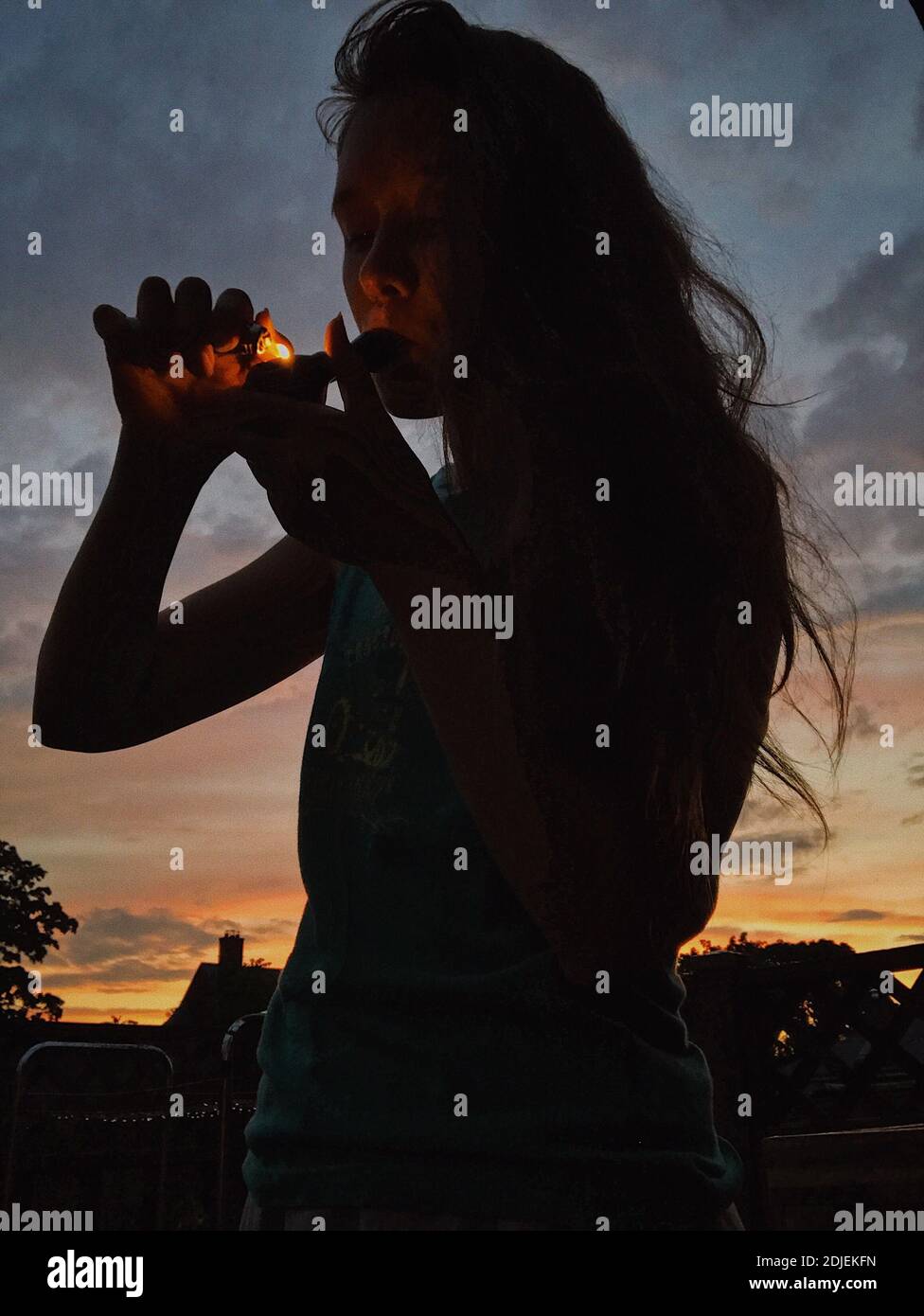 Woman smoking pipe hi-res stock photography and images - Alamy