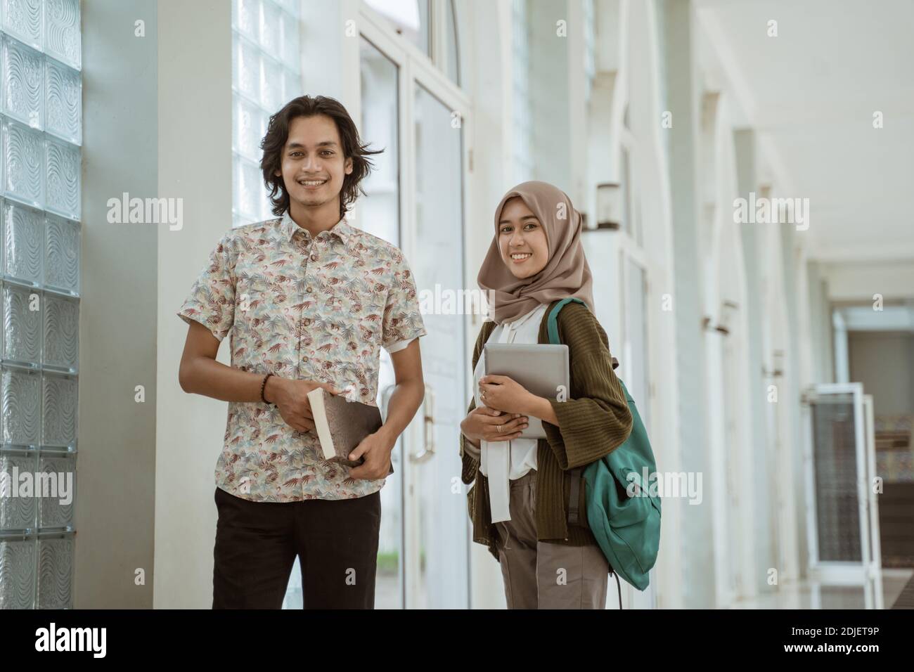 Portrait happy students looking at the camera on the campus Stock Photo ...