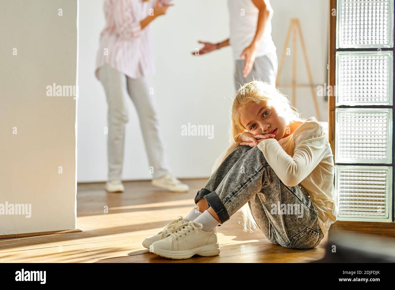 girl portrait of child sitting alone suffering from family crisis ...