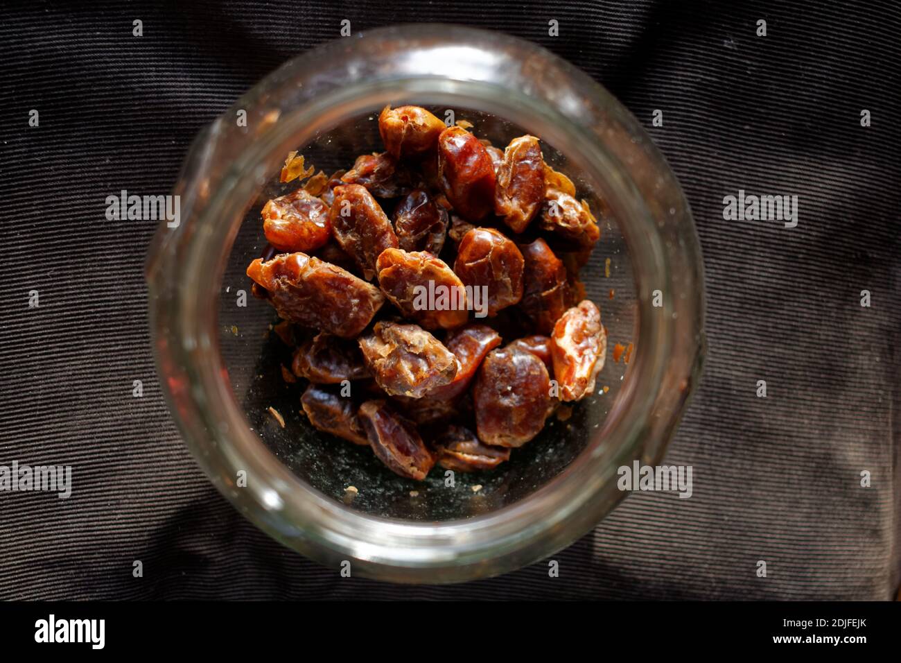 Dates in a big glass jar Stock Photo - Alamy