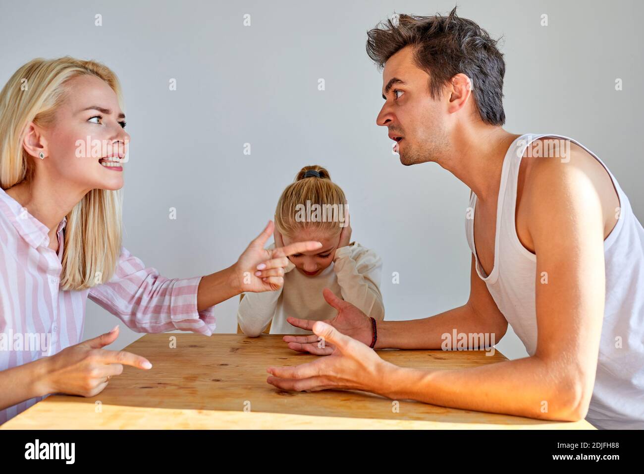 Tired parents ignoring child hi-res stock photography and images - Alamy