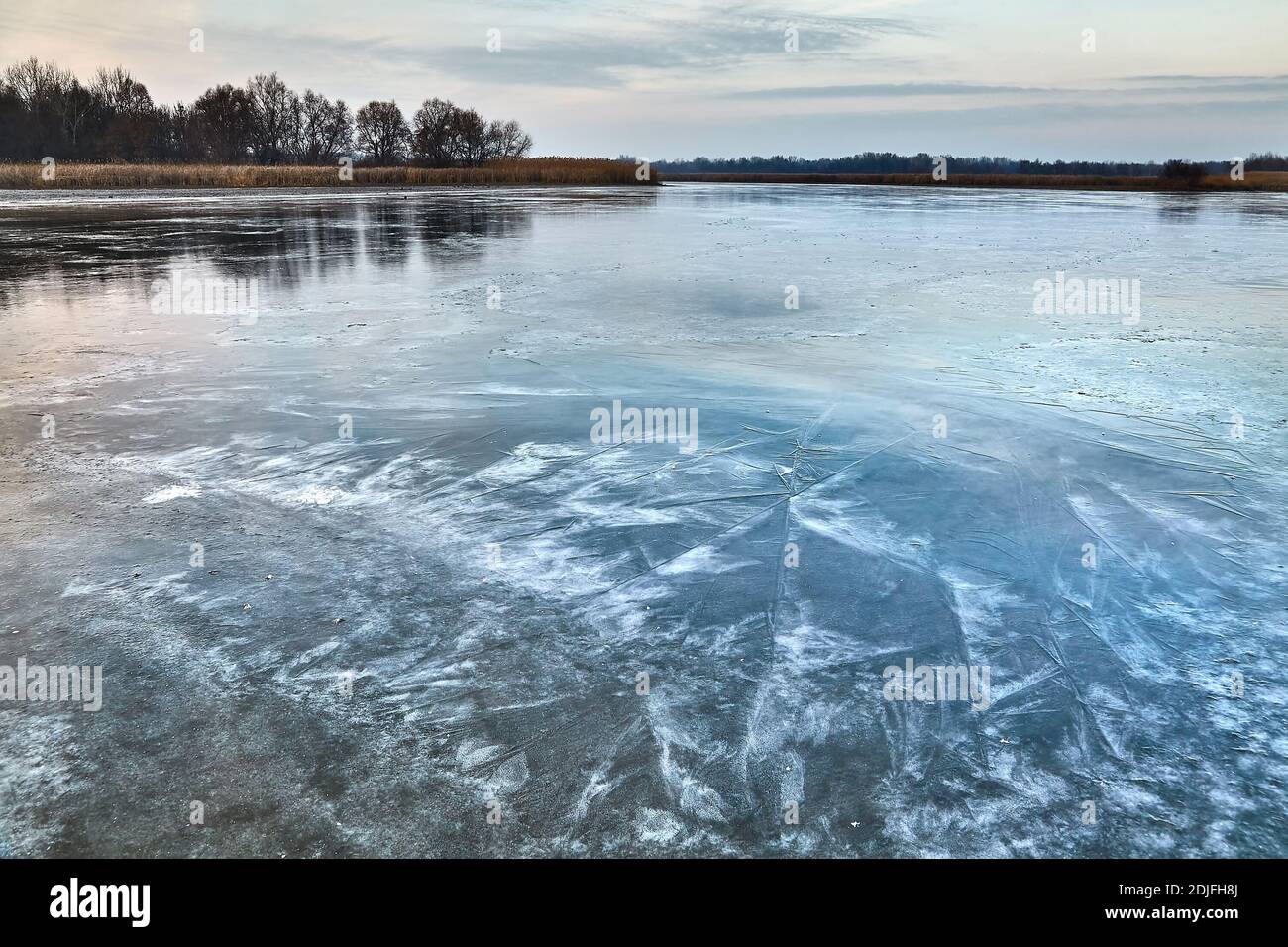 Frozen lake ice surface Stock Photo - Alamy
