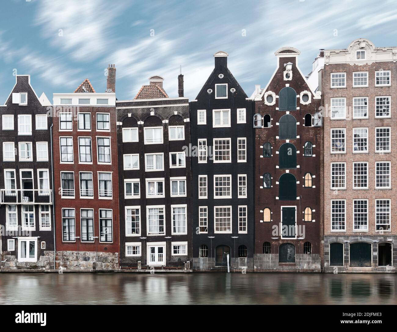 Long exposure picture of traditional Amsterdam old town architecture ...