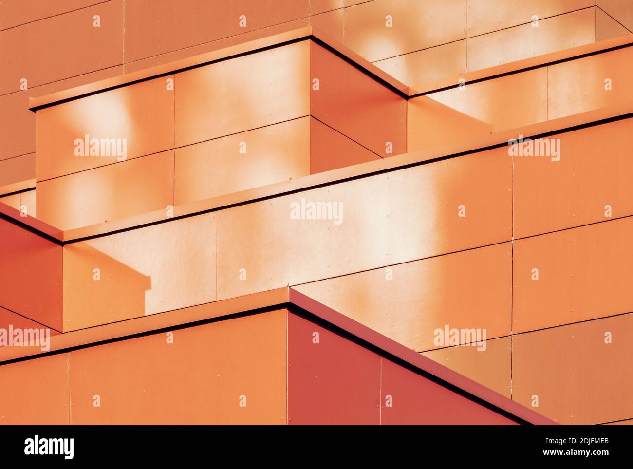 Orange colored geometric background of metal building facade. Abstract ...