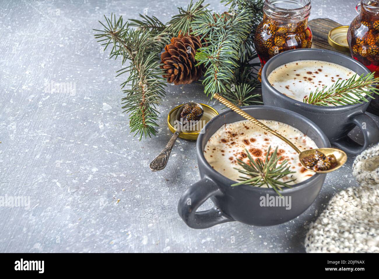 Coffee latte with pine needles and pine cone jam, trendy organic winter ...