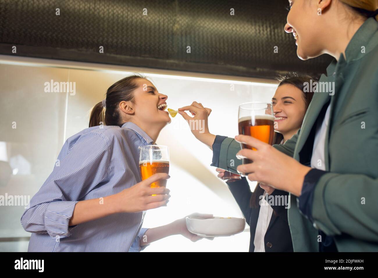 Snack happy co workers hi-res stock photography and images - Alamy