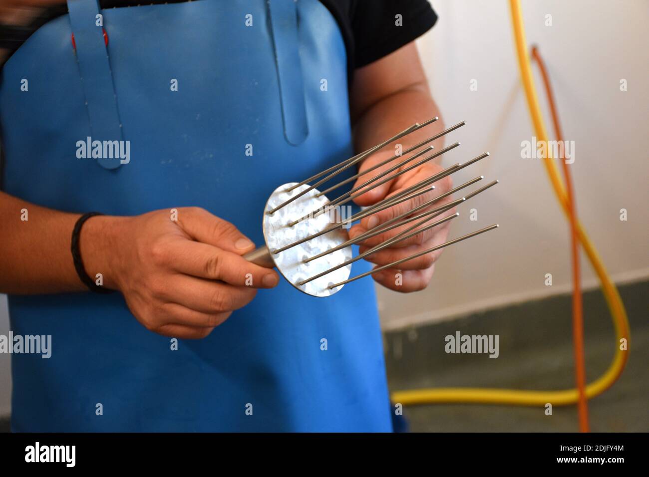 Manual stainless steel device for making holes in cheese Stock Photo ...