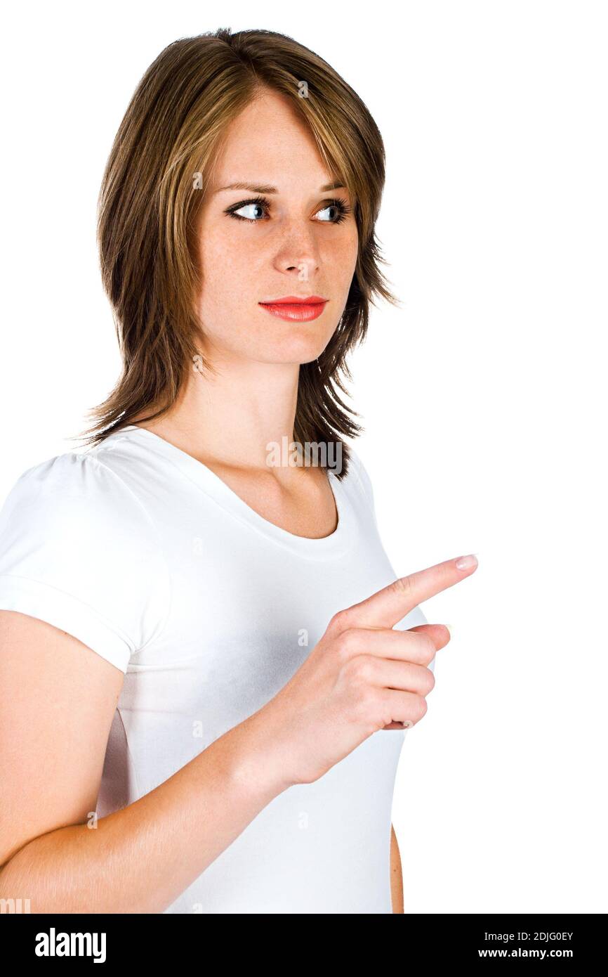 woman pointing the finger at space, isolated on a white background ...