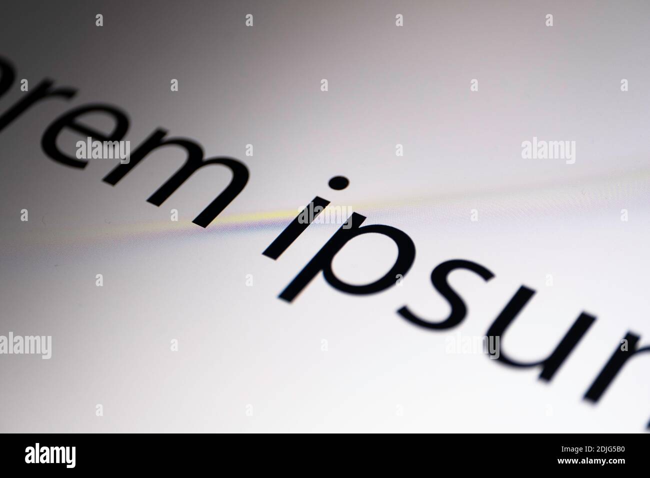 Close-up of part of black and white Lorem Ipsum text diagonally across ...