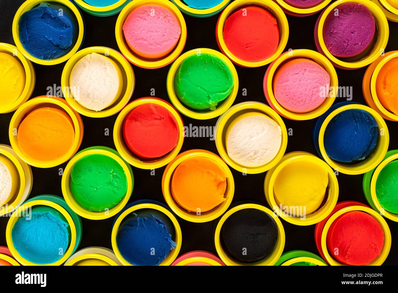 Abstract background from colorful containers of pastel colored ...