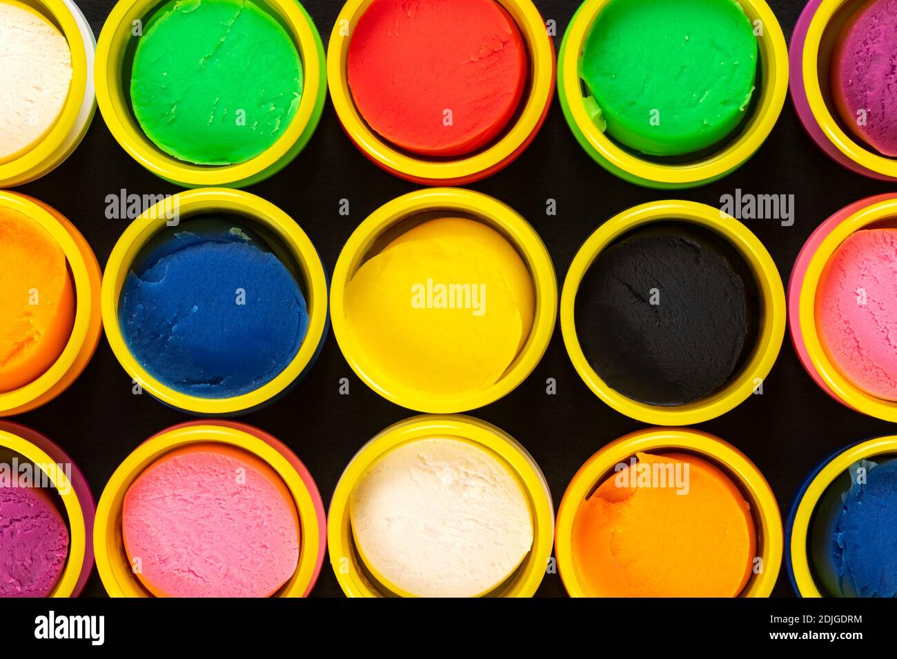 Abstract background from colorful containers of pastel colored ...