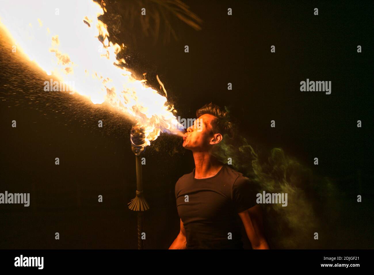 Fire eater blowing flame hi-res stock photography and images - Alamy