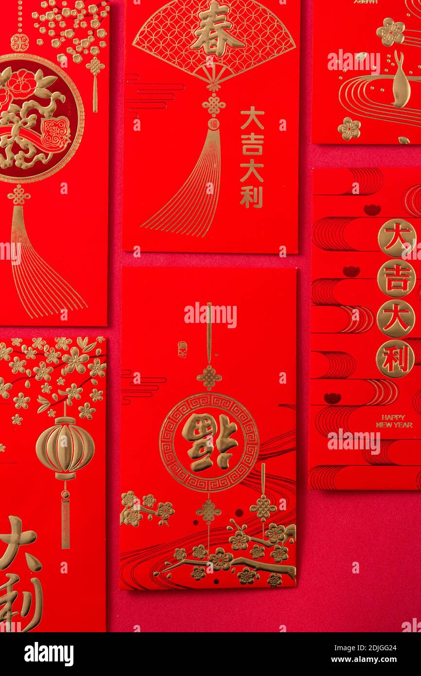 Different Chinese new year festival envelopes on red background Stock ...