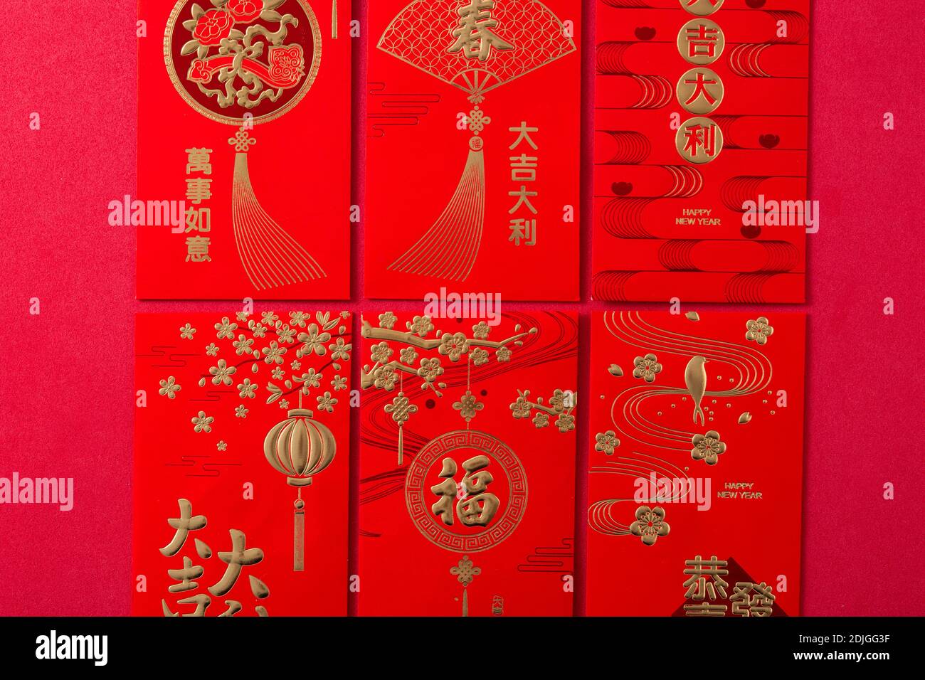 Different Chinese new year festival envelopes on red background Stock ...