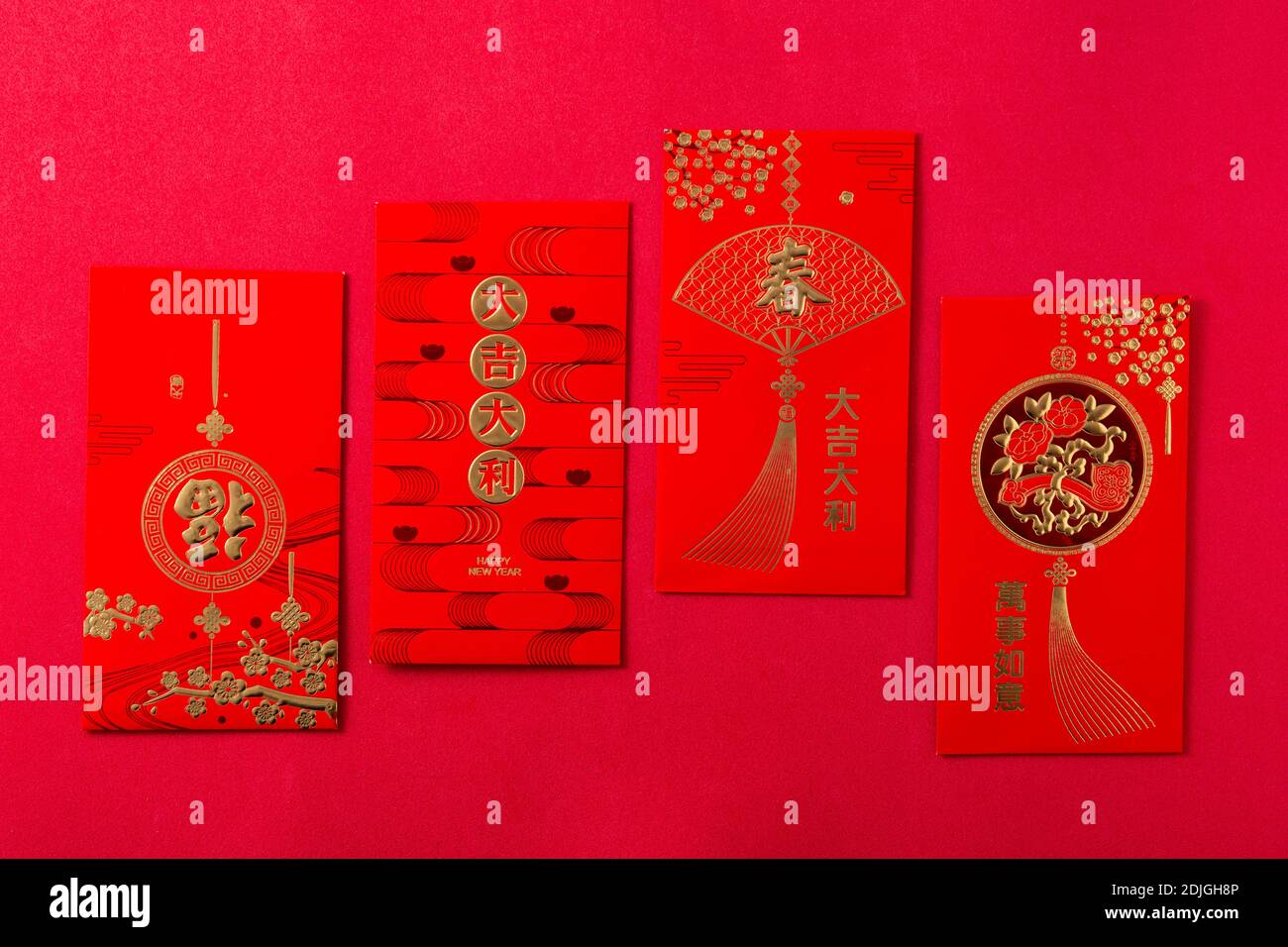 Different Chinese new year festival envelopes on red background Stock ...
