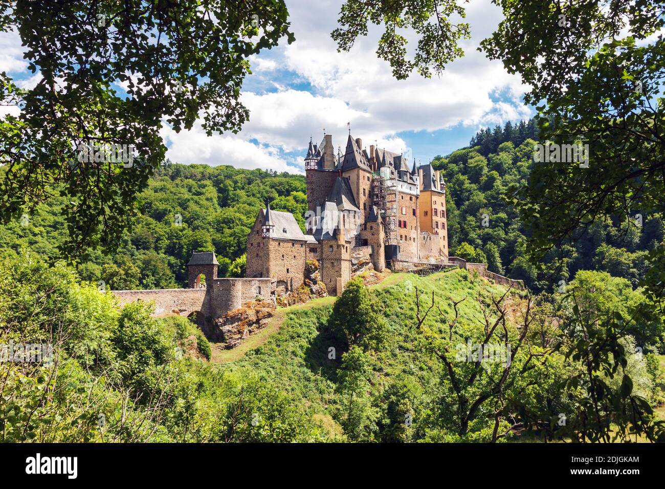 Medieval Eltz Castle nestled in the hills above the Moselle River ...
