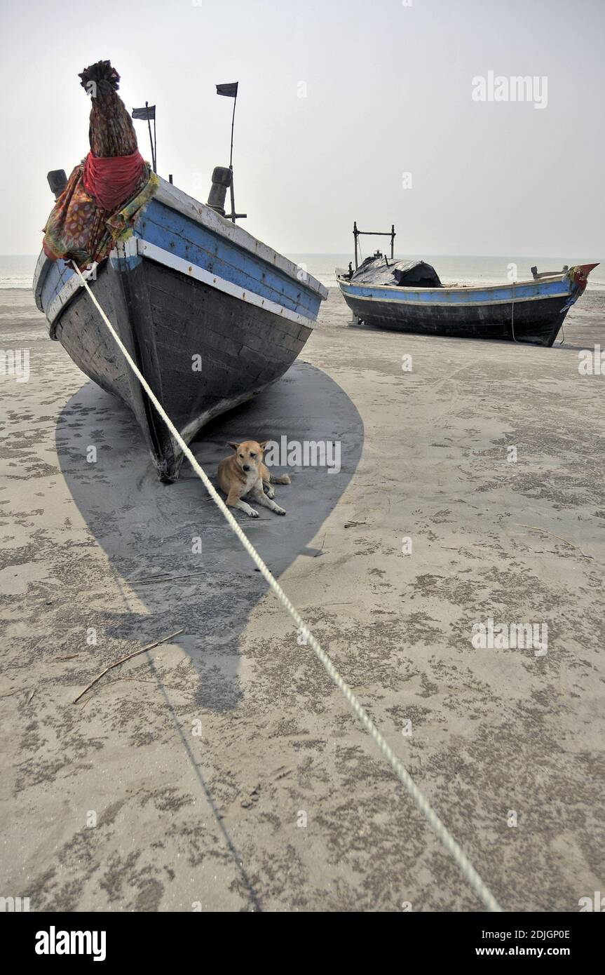 Two fishing boats standing on Bakkhali beach. They are waiting for the ...