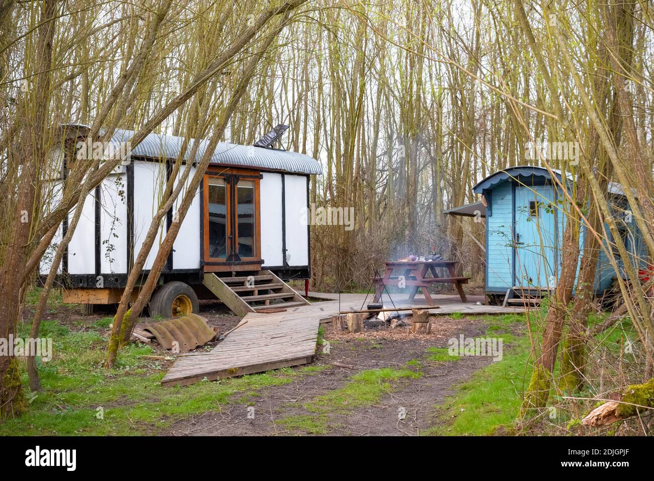 Camping in a wood with converted train carriages in Gloucestershire ...