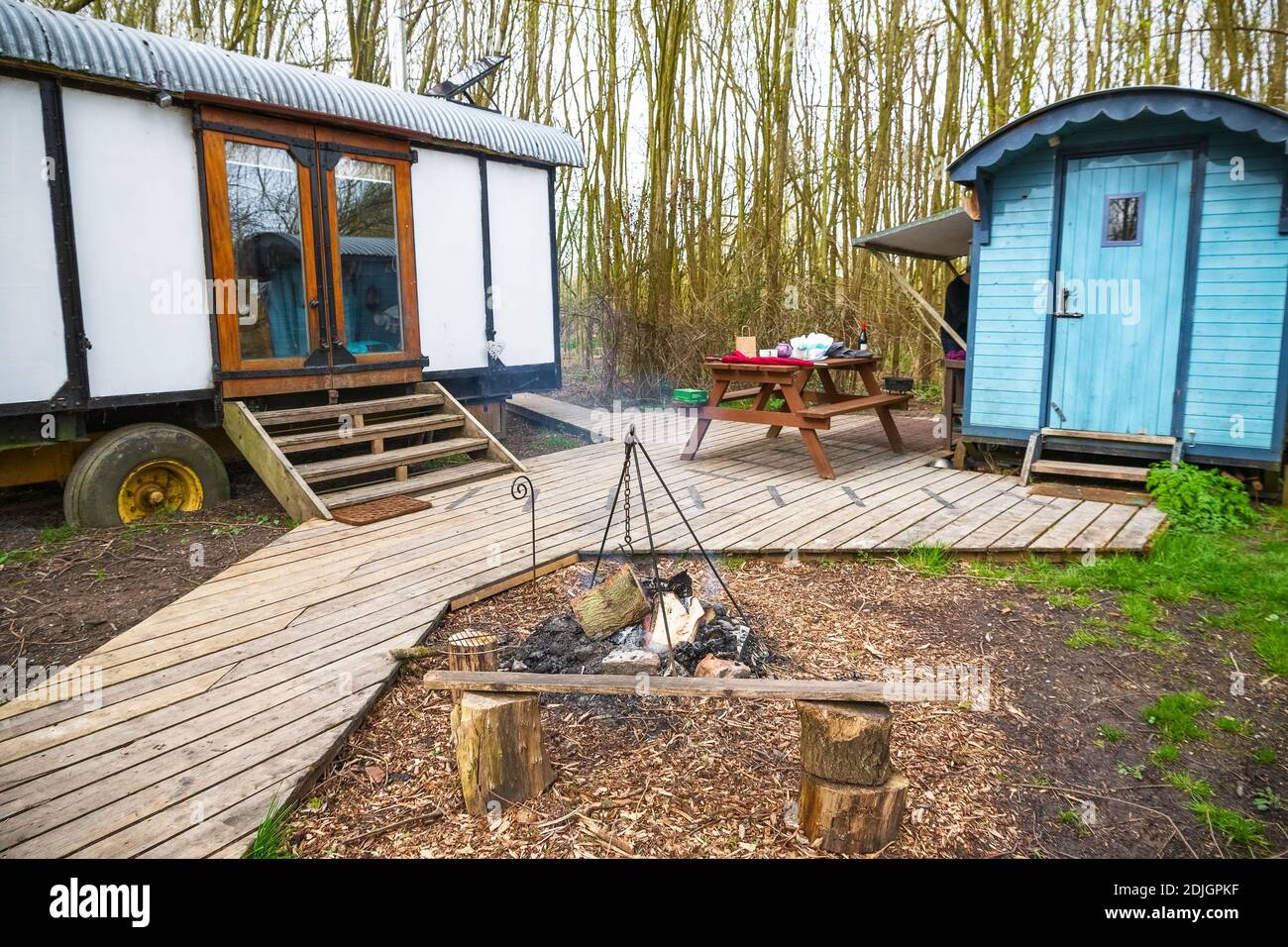 Camping in a wood with converted train carriages in Gloucestershire ...