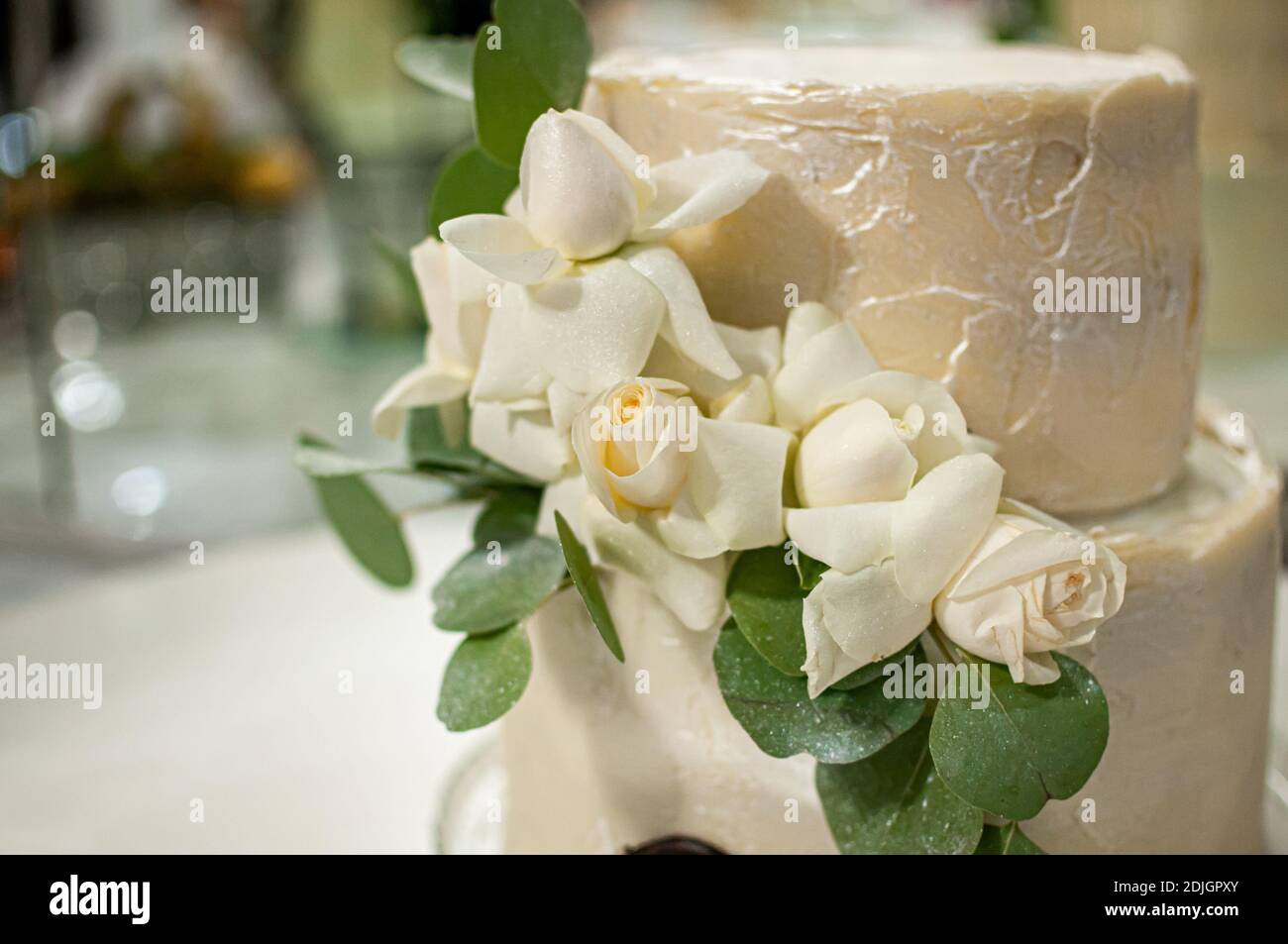 The wedding cake. Wedding buffet. Cake decorated with roses Stock Photo ...