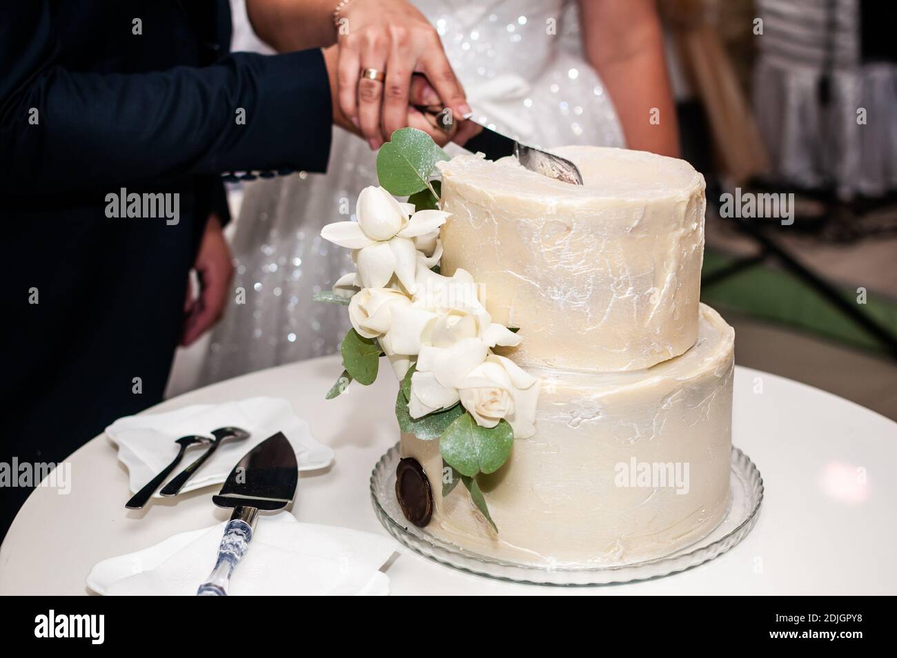 The wedding cake. Wedding buffet. Cake decorated with roses Stock Photo ...