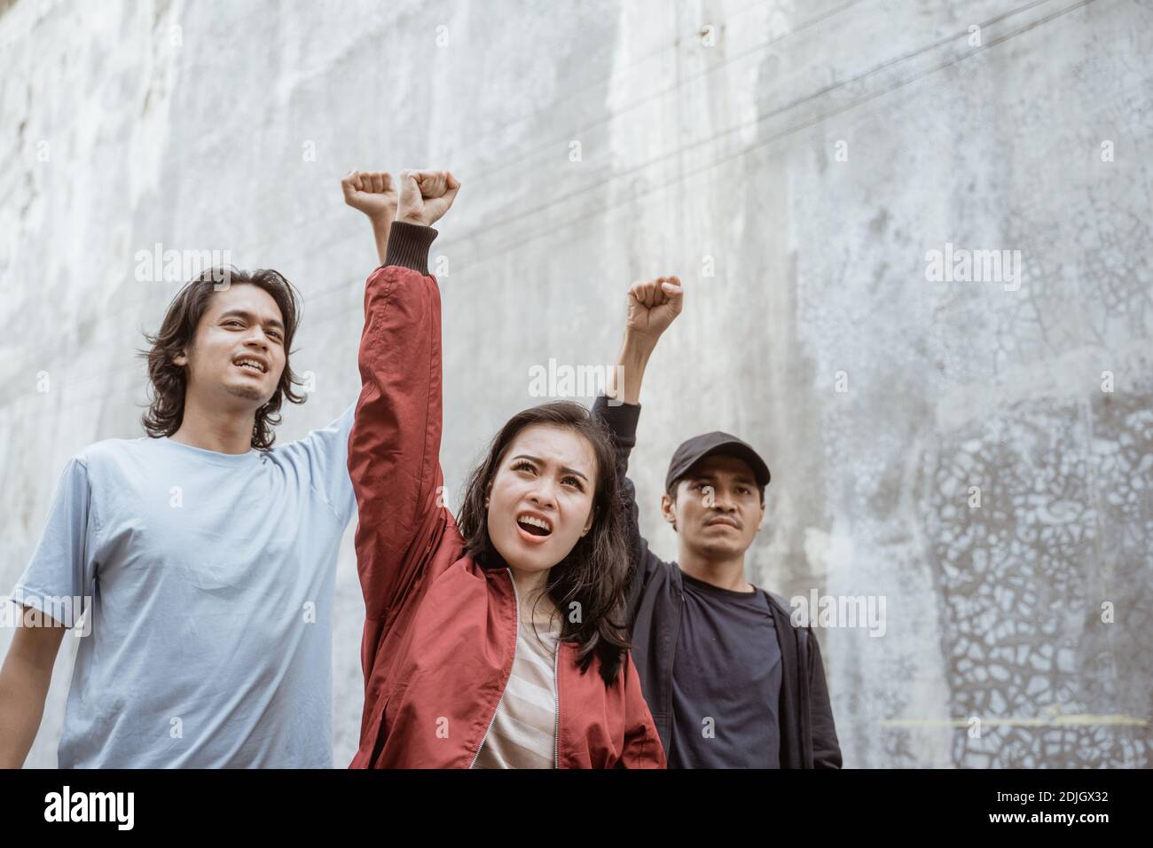 Portrait students who are burning with enthusiasm doing a demonstration ...