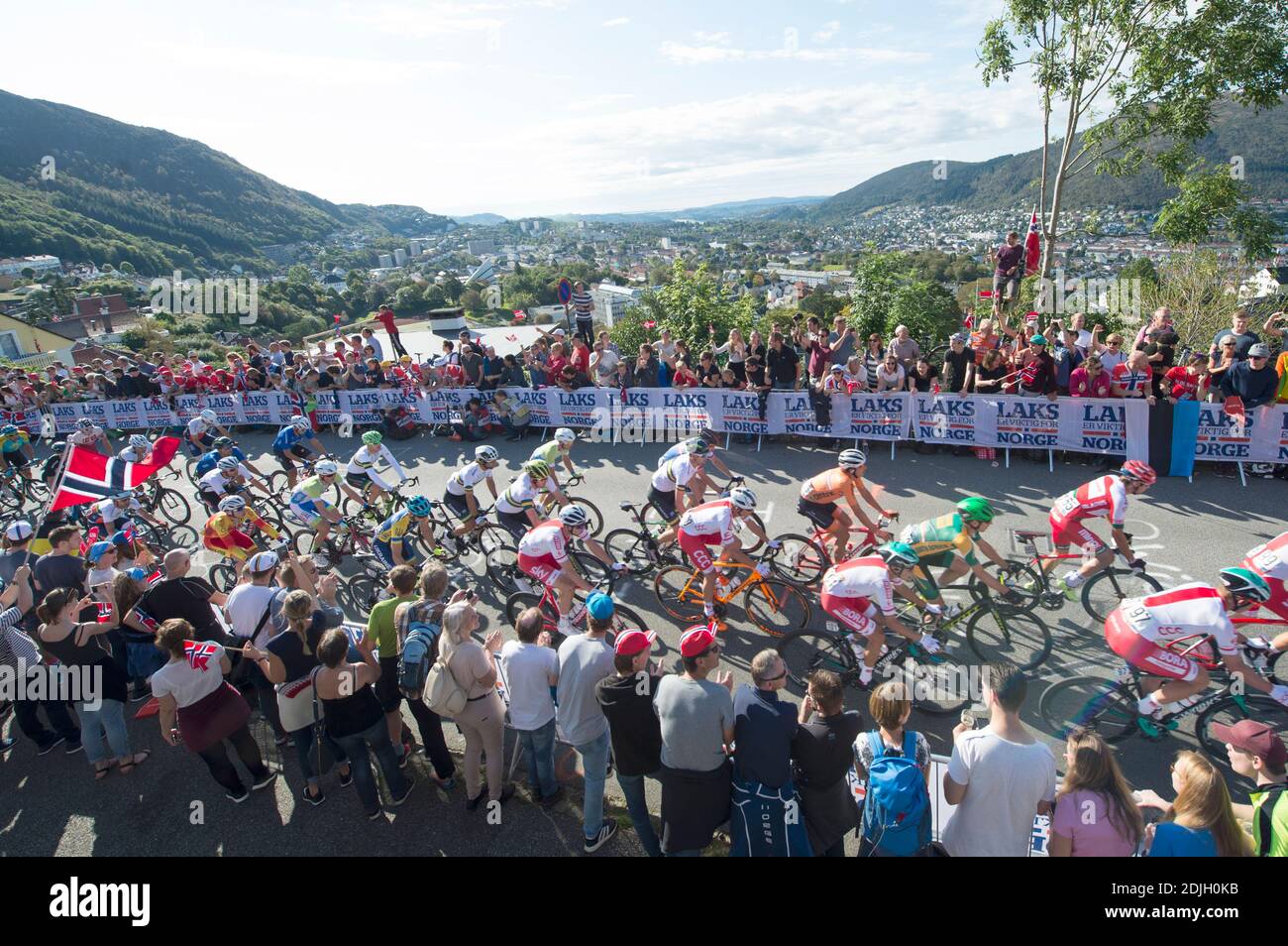 Cycling fans cheer on riders in the UCI Road Cycling World ...