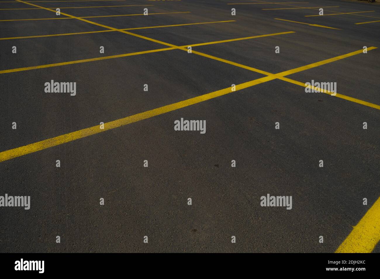 yellow lines in the big black asphalt international way, asphalt ...