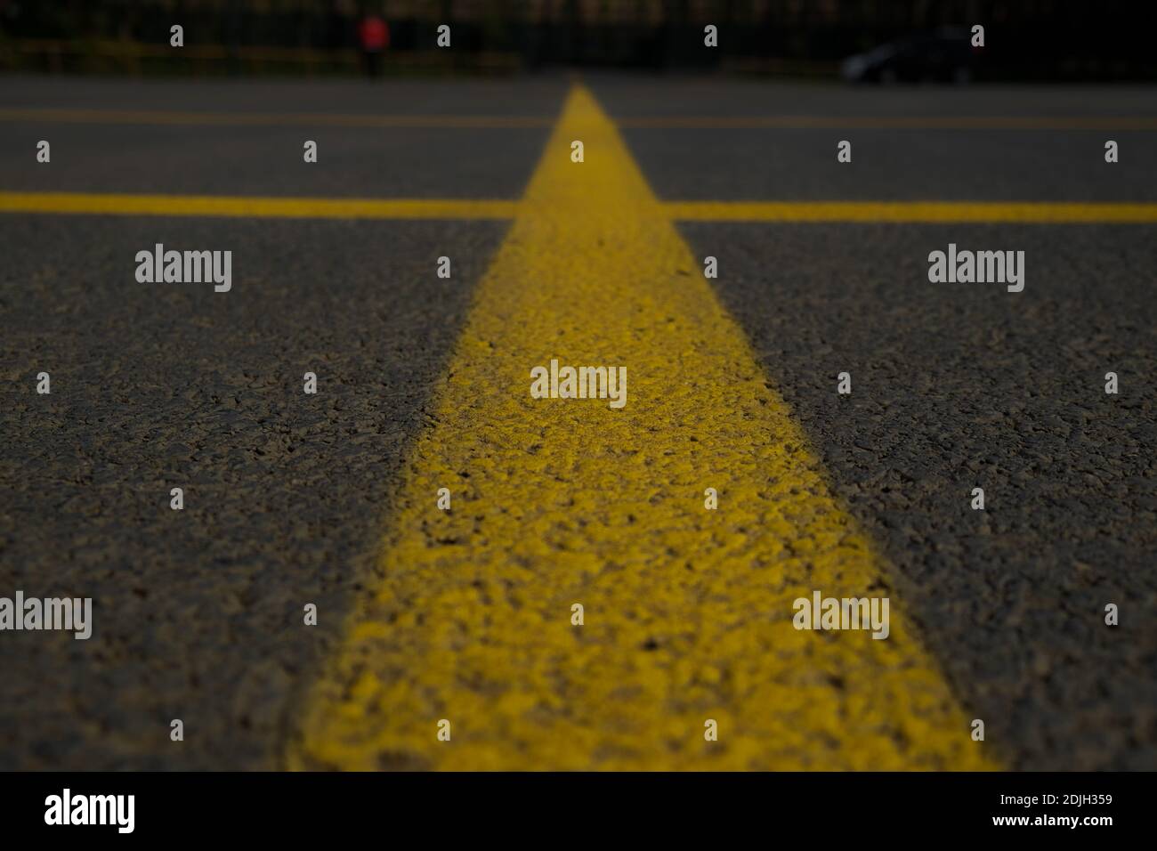 yellow lines in the big black asphalt international way, asphalt ...