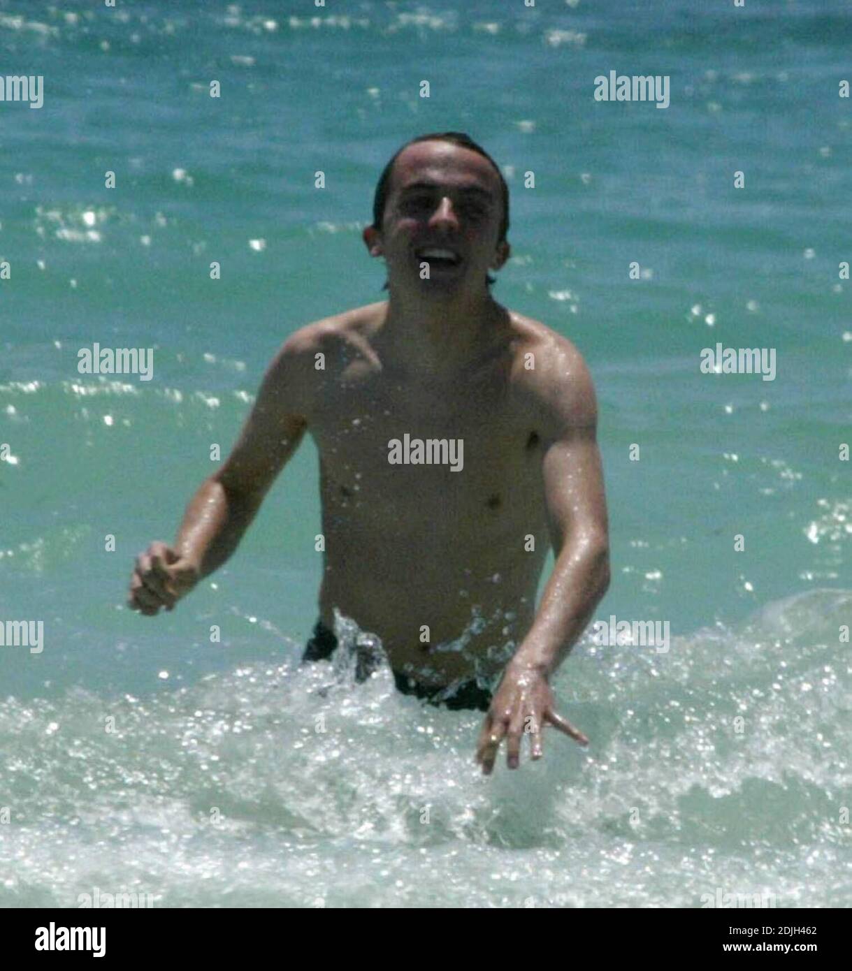 Frankie Muniz and fiancee Jamie Gandy on Miami Beach. Frankie played in ...