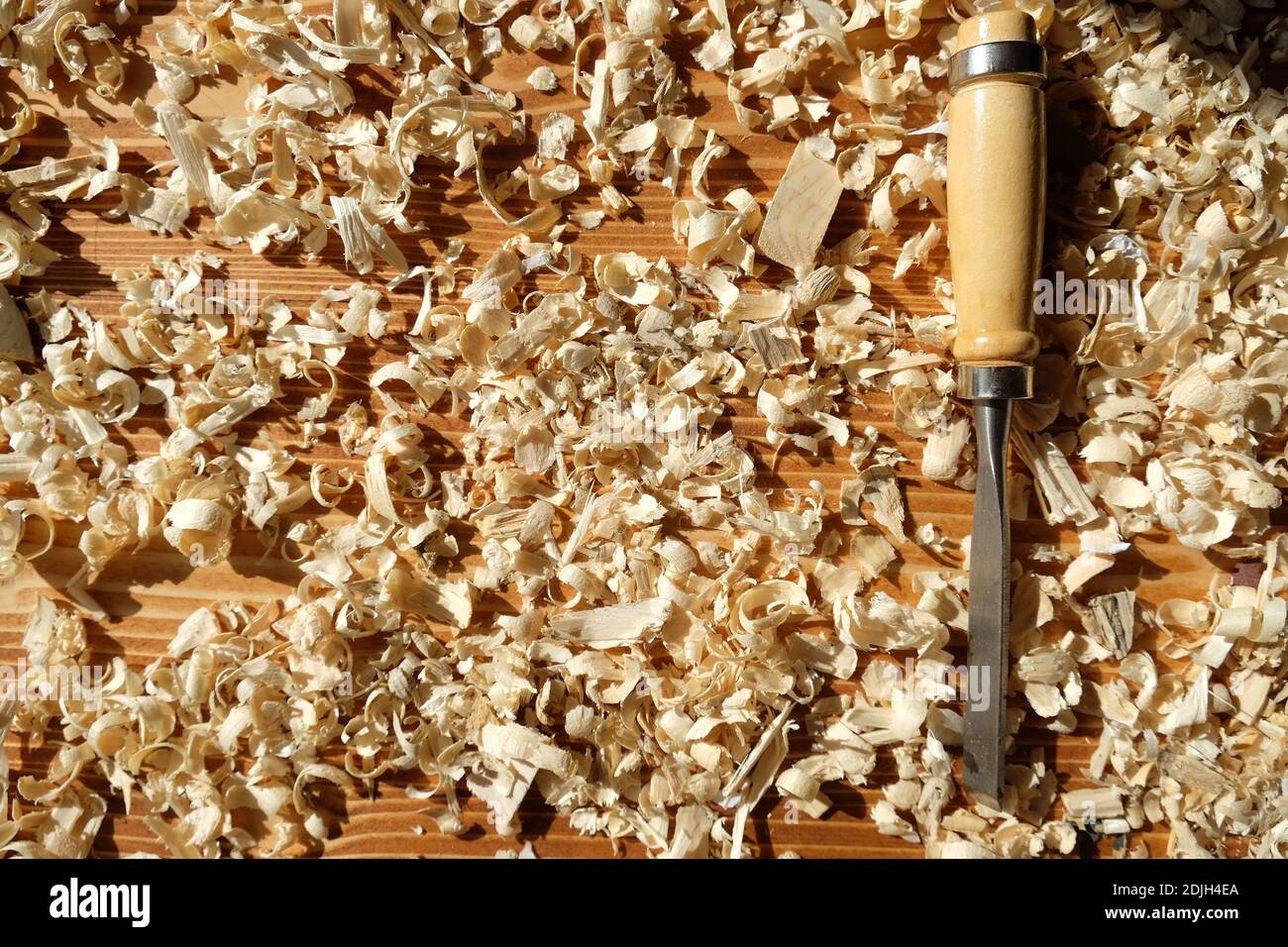 hobby toll chisels on the carpenter's workbench, chisel in the yellow ...