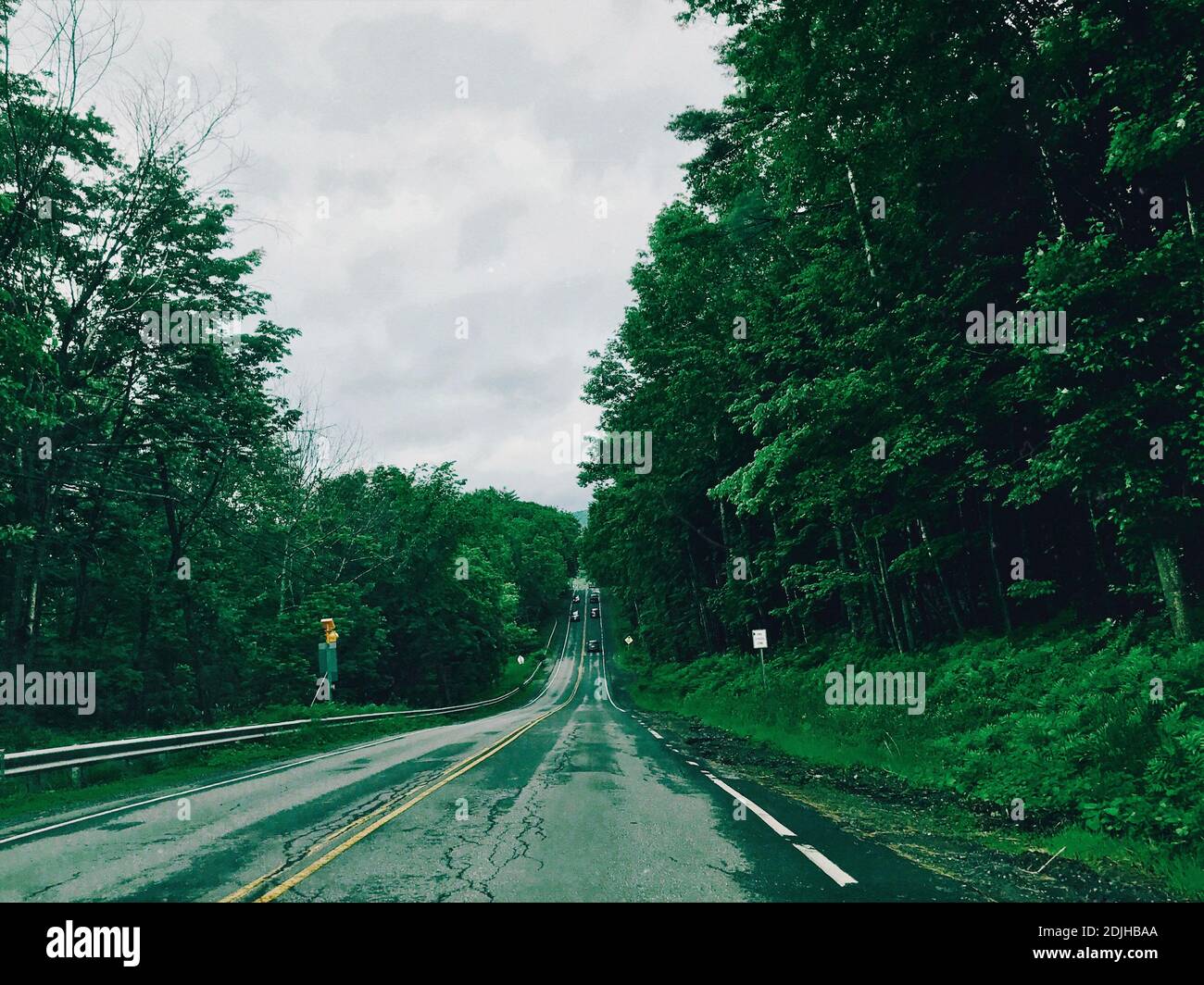 Road Drying After It Rained Stock Photo - Alamy