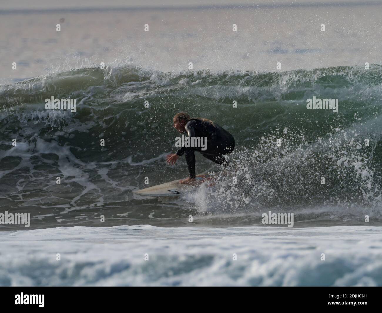 Surfer enjoying the waves at La Jolla Shores, San Diego, California ...