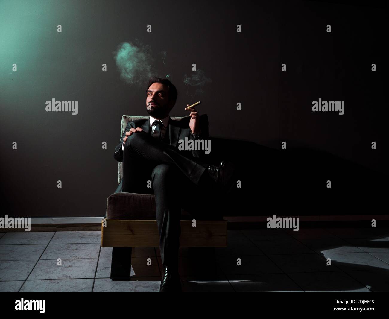 Sitting On Chair And Smoking High Resolution Stock Photography and ...