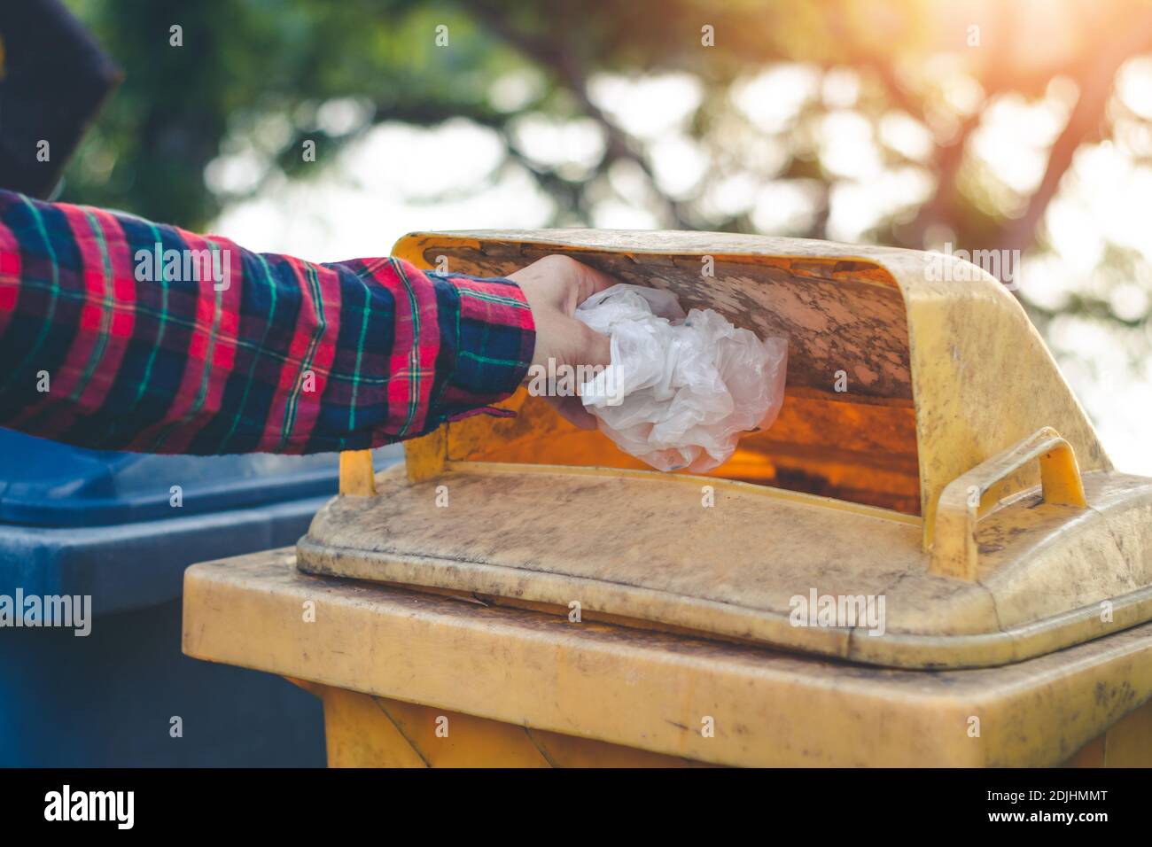 Throwing Garbage In Bin High Resolution Stock Photography and Images ...