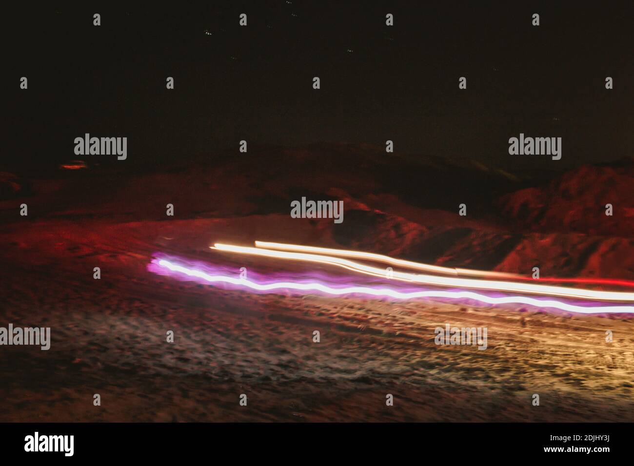 A fantastic shot of light trails in the desert Stock Photo - Alamy