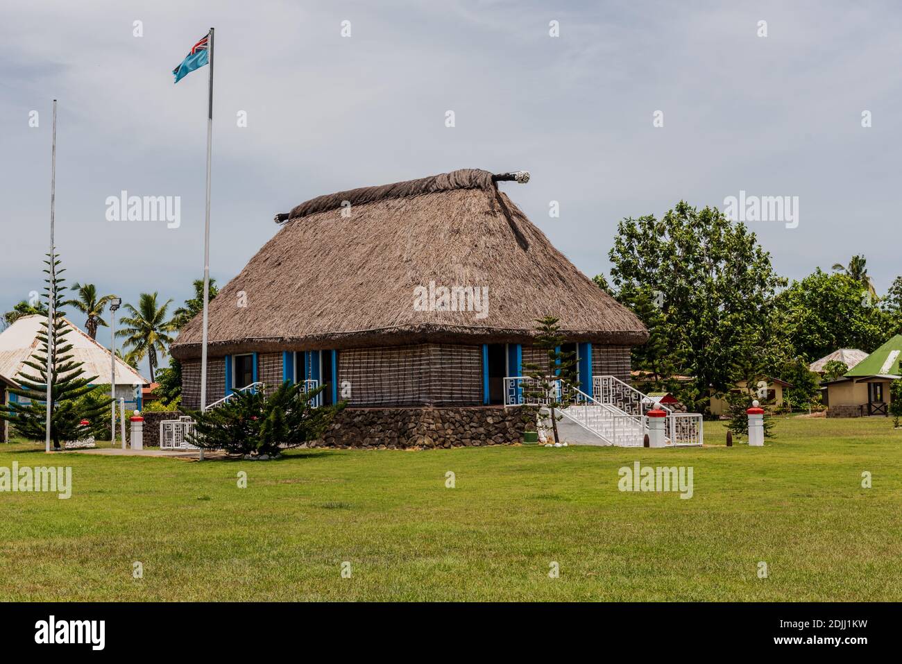 The house of the village chief stands taller than the rest on this ...