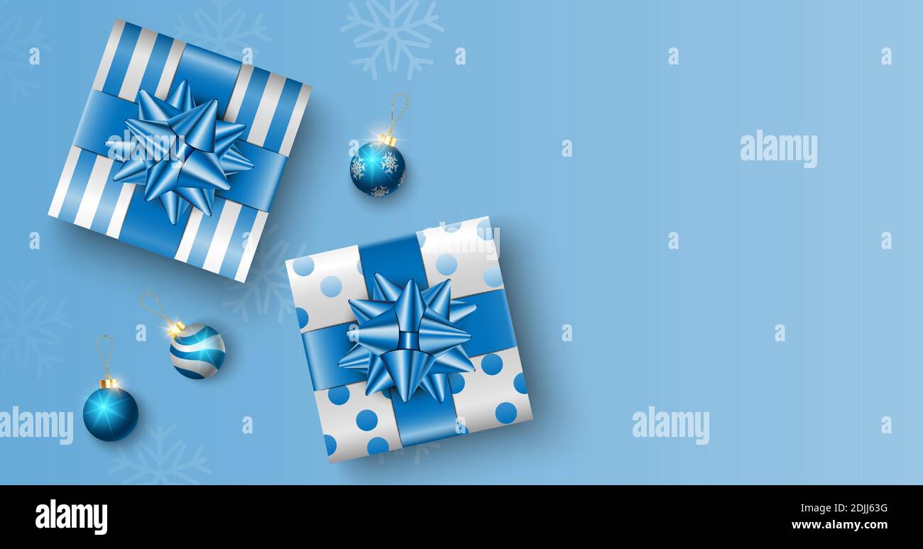 Christmas gifts on blue box background with copy space for text ...