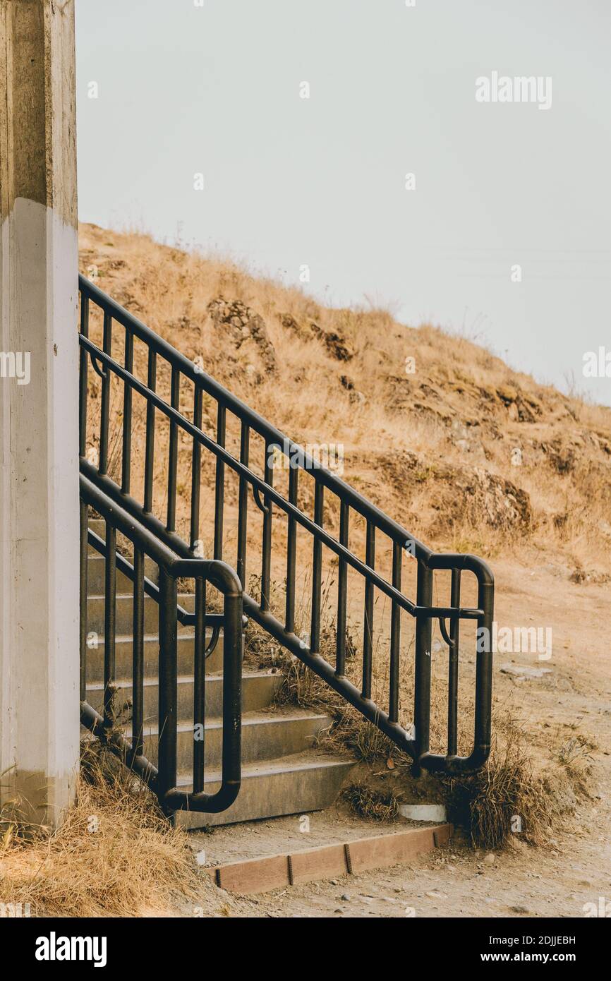 Between the railing hi-res stock photography and images - Alamy