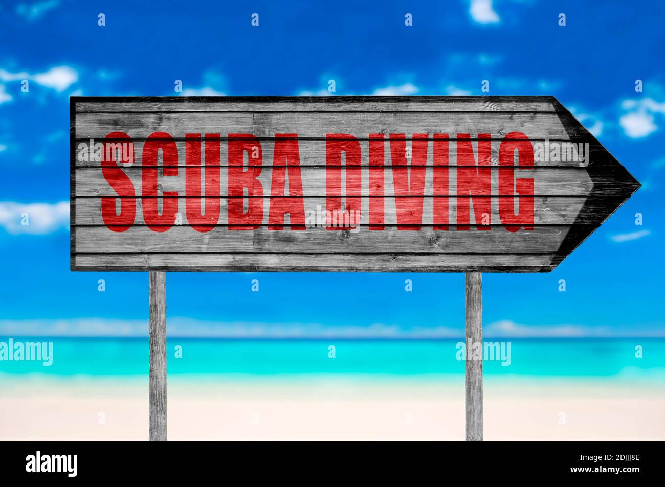 Red Scuba Diving wooden sign with a beach on background Stock Photo - Alamy